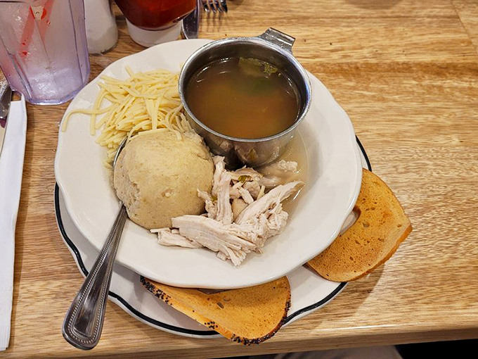 That perfectly formed matzo ball could win architectural awards&mdash;its golden-hued exterior giving way to a cloud-like interior that's worth crossing state lines for.