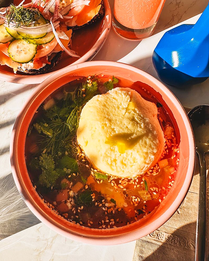 This isn't just soup – it's liquid comfort, with a matzo ball so perfectly executed it deserves its own victory parade.