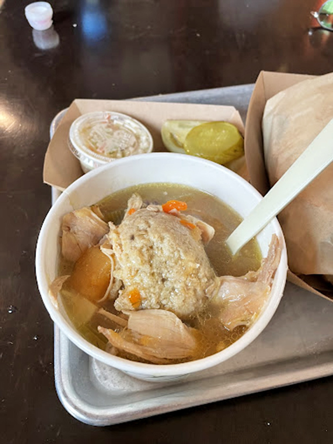 This isn't just soup&mdash;it's liquid comfort served alongside what appears to be the world's most perfect pickle, nature's palate cleanser.