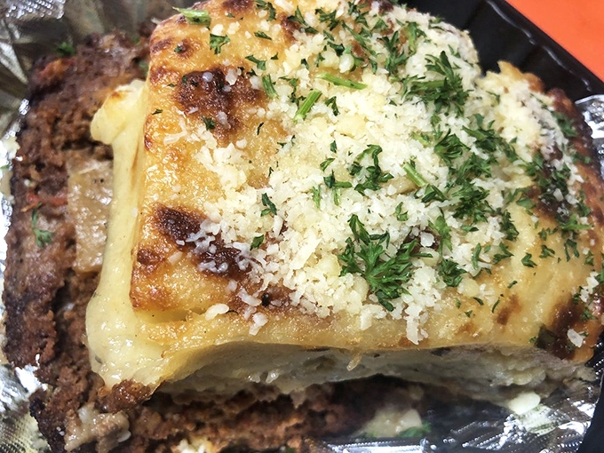 Moussaka that would make Odysseus extend his journey &ndash; layers of eggplant, seasoned beef, and b&eacute;chamel sauce that's worth every single calorie.