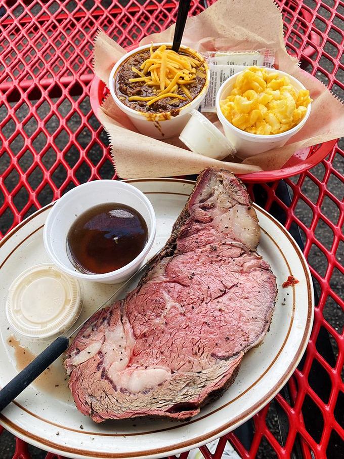 Prime rib that makes you question every other piece of beef you've ever eaten. The smoke ring is practically a halo. 
