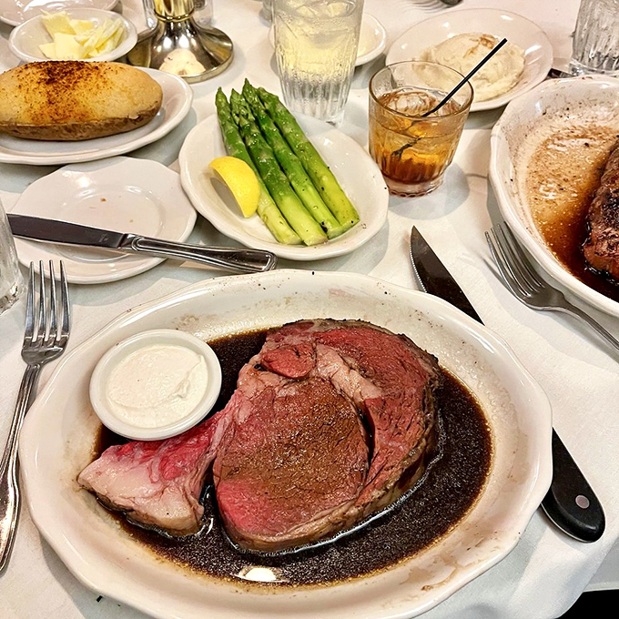 The prime rib and its faithful companions—creamed spinach and mashed potatoes. A trio that's been making special occasions more special since 1948.