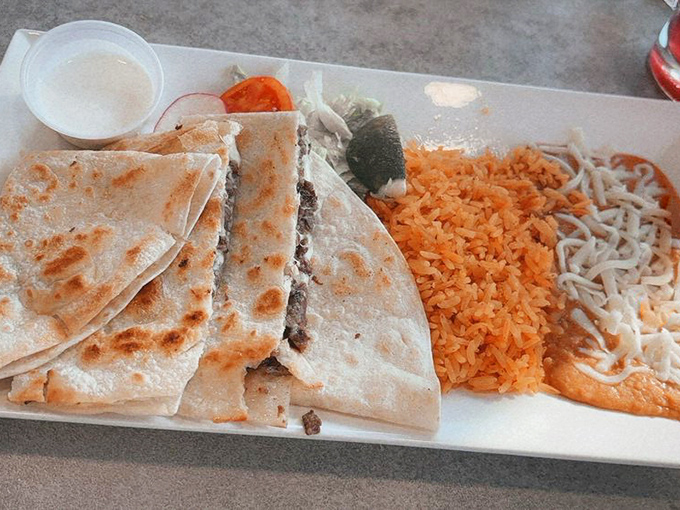 This quesadilla plate could solve international conflicts. Notice how the refried beans have that homemade shimmer no can could ever provide.