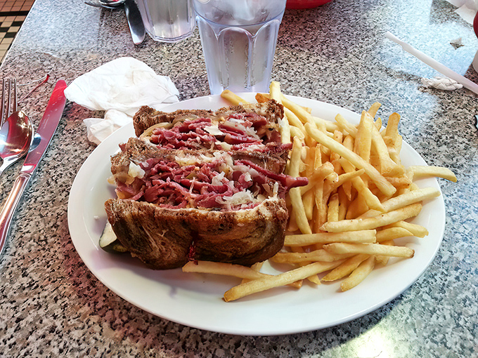 The Reuben sandwich: where corned beef, Swiss cheese, and sauerkraut hold their annual meeting to discuss how to properly delight your taste buds.