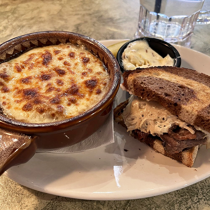 The dynamic duo that dreams are made of: a hearty Reuben sandwich playing perfect wingman to the star of the show.