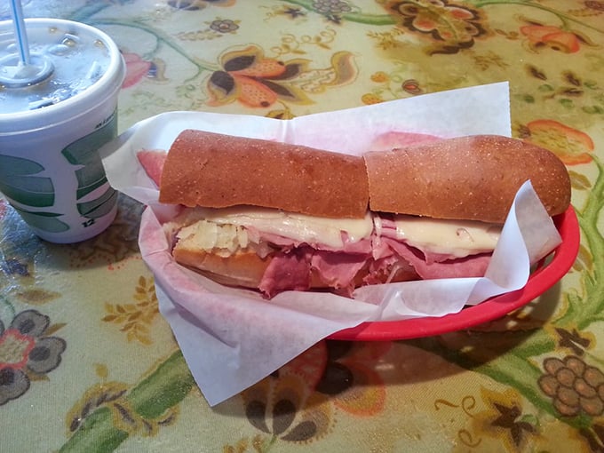 The Reuben on wheat—where sauerkraut and corned beef perform a perfect culinary tango. Like watching Fred and Ginger dance, but you can eat it.