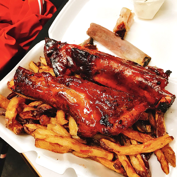 The holy trinity of comfort: ribs, fries, and the knowledge that diet plans were made to be broken.