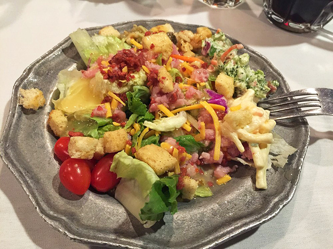Salad bar artistry at its finest. This isn't just roughage—it's a colorful prelude to the main event, thoughtfully assembled with all the fixings.
