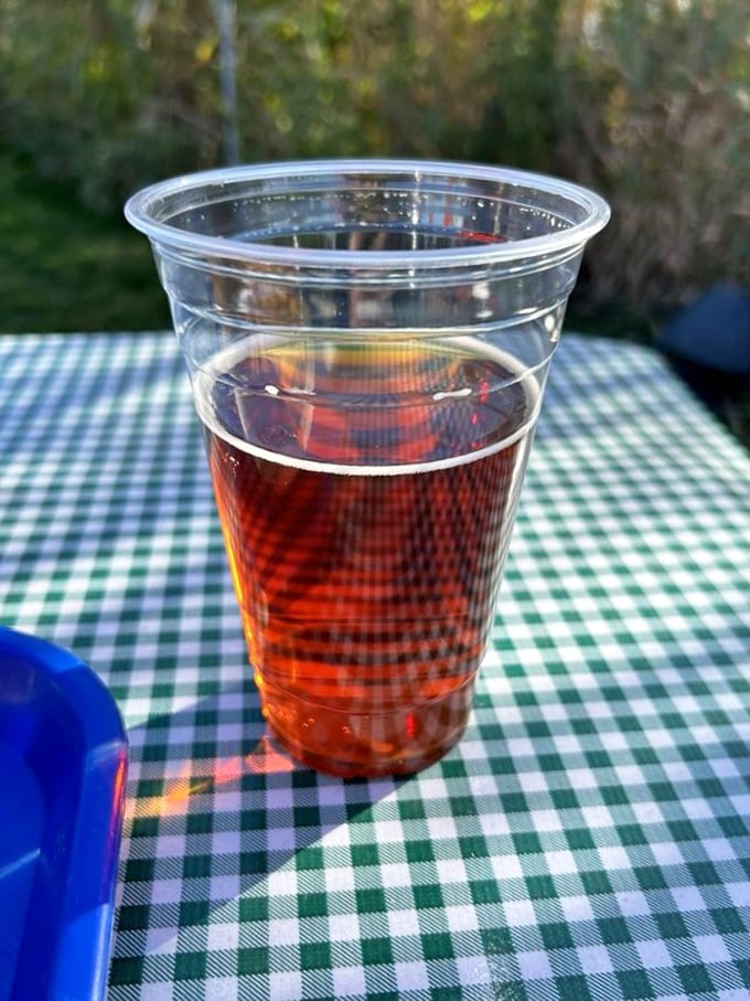 Nothing complements seafood quite like a cold beer on a checkered tablecloth. Simple pleasures are often the most profound.