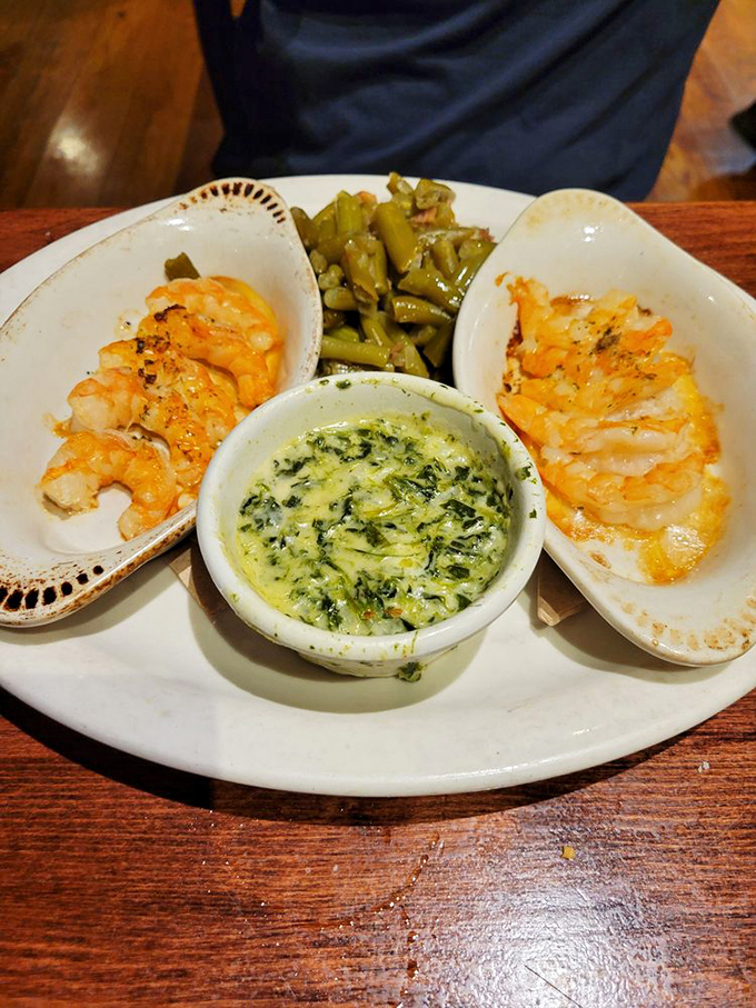 These scampi aren't just swimming in sauce&mdash;they're doing the backstroke in buttery, herby heaven while green beans keep watchful company.