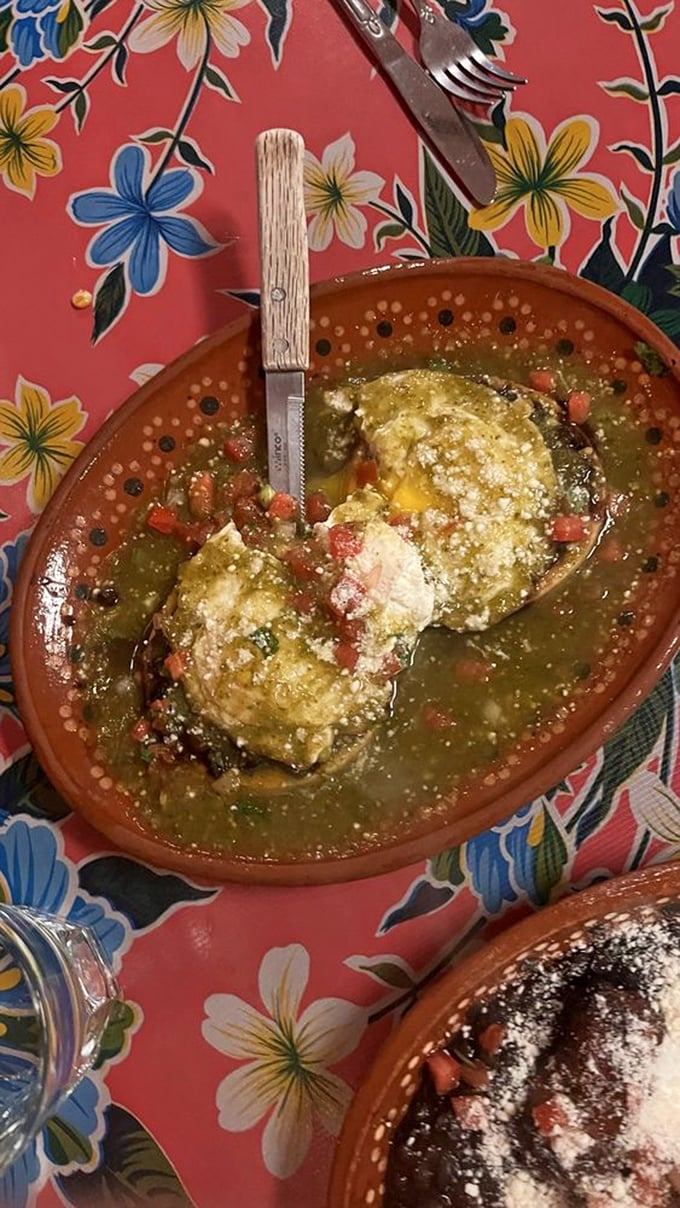 Sopes con huevo floating in vibrant salsa verde&mdash;like little edible rafts of joy. The perfect marriage of crispy, soft, tangy, and rich.