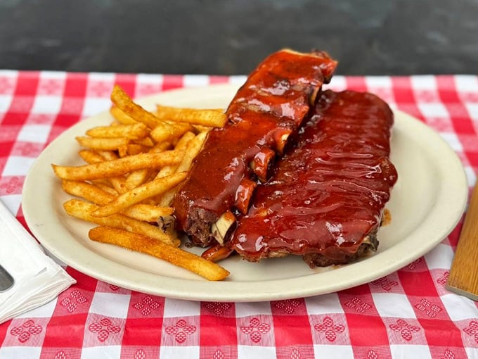 Barbecue ribs glistening with sauce that would make even the most dedicated white shirt-wearer throw caution to the wind. 