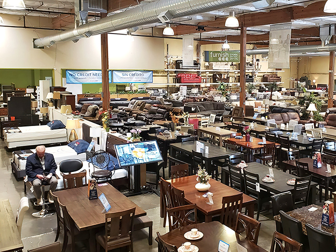 The warehouse layout creates a treasure-hunt atmosphere where turning each corner might reveal your next favorite piece.