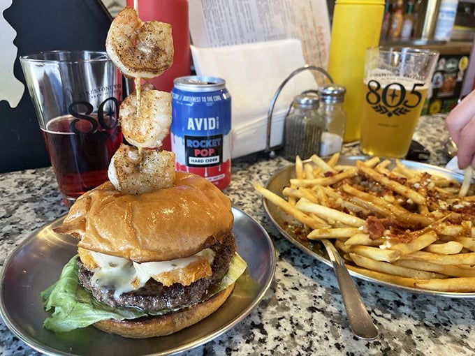 Land meets sea in perfect harmony. The surf and turf burger pairs with poutine fries for a meal that crosses borders deliciously.