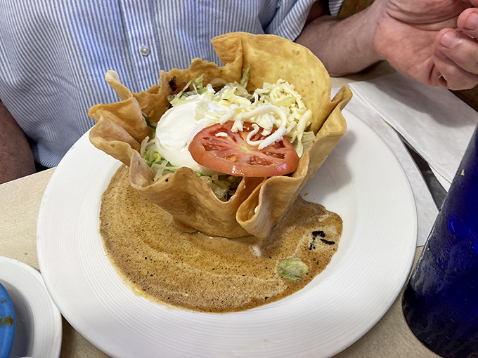 It's not just a taco bowl&mdash;it's architectural genius. The edible fortress protecting a kingdom of flavors, crowned with the perfect dollop of sour cream.