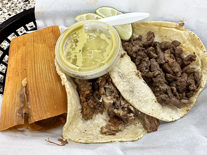 The tamale and taco carnitas combo&mdash;proof that some of life's greatest pleasures come wrapped in the humblest packages.