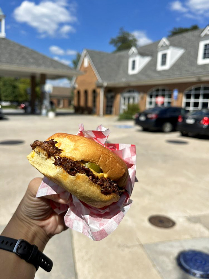 The Classic in its natural habitat, where pickle-to-beef ratio achieves mathematical perfection. This isn't food; it's edible geometry.