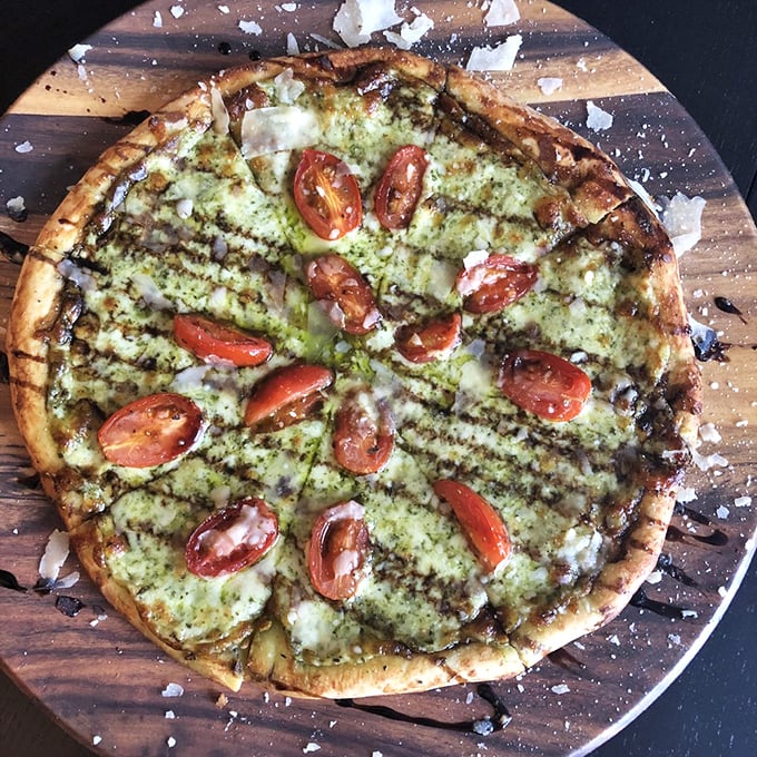 The Jacques Cousteau of flatbreads&mdash;an exploration of green pesto seas dotted with tomato islands that would make any underwater explorer proud.