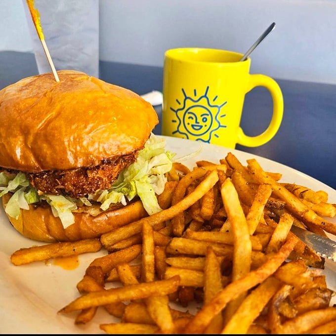 This isn't just a sandwich; it's architectural genius. The Spicy Colonel stands at attention with perfect golden fries as loyal soldiers.