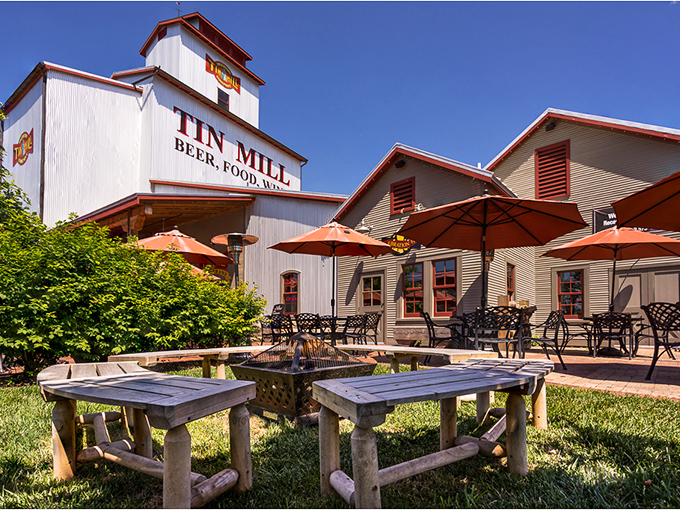 The Tin Mill's outdoor seating area isn't just a patio&mdash;it's an invitation to linger over local brews while the world rushes elsewhere.