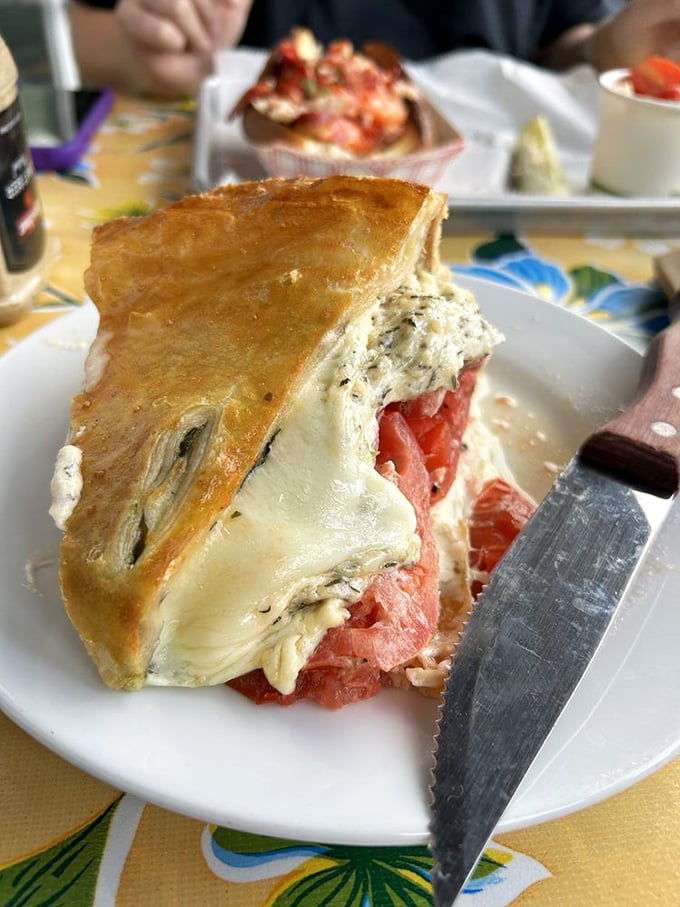 This tomato pie isn't just food&mdash;it's edible art. The melted cheese pulls away in strings that belong in a dairy dreamscape.