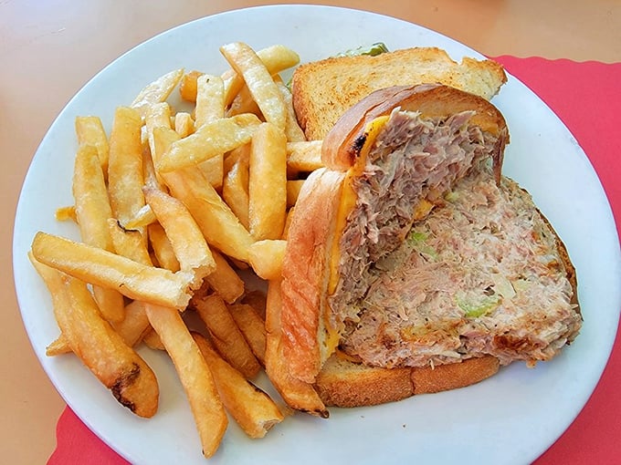 The humble tuna melt, elevated to art form. Those golden fries aren't sidekicks&mdash;they're co-stars in this lunchtime production.
