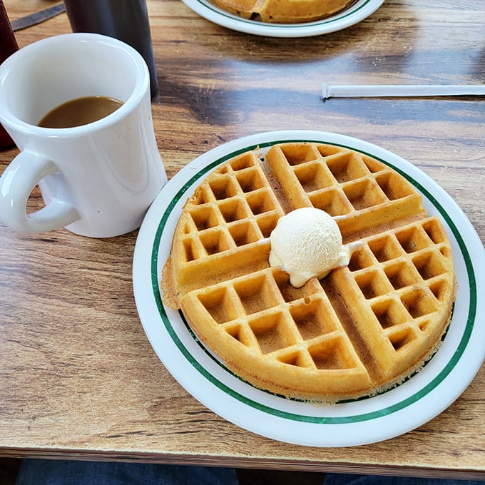 Golden waffle perfection with a scoop of butter slowly melting into those perfect squares. Some mornings just demand a waffle.