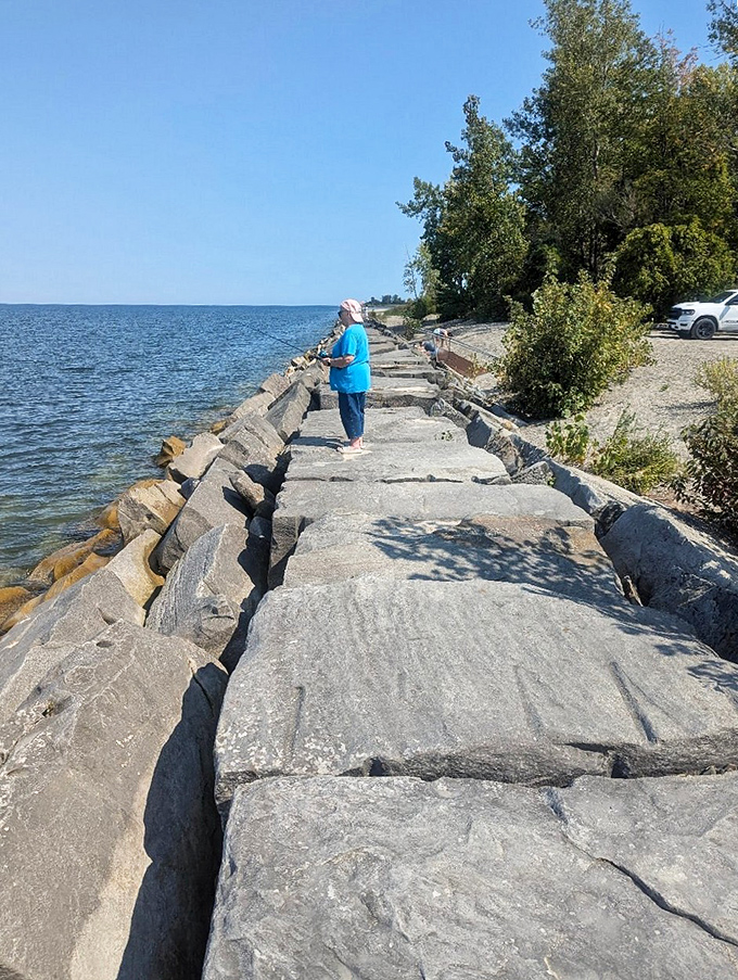At Walnut Beach, retirement dollars stretch as far as the horizon while locals fish from rocky outcroppings that would cost a fortune in coastal hotspots.