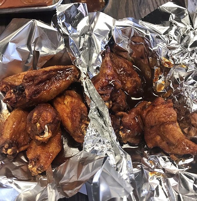 These wings have clearly been introduced to smoke and fire in the most intimate way&mdash;crispy, glazed, and absolutely irresistible.