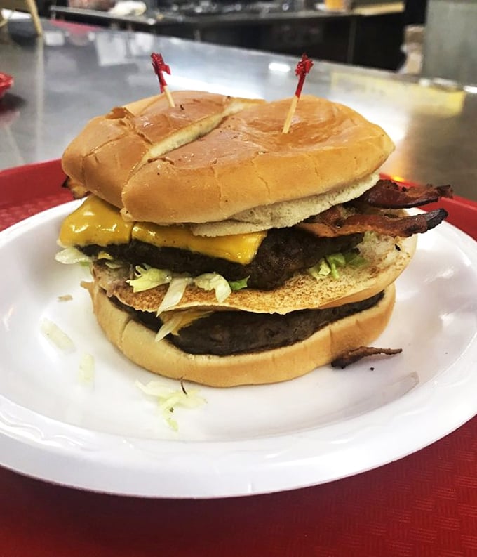 The bacon cheeseburger stands tall and proud, like a delicious skyscraper of flavor that dares you to figure out how to fit it in your mouth.