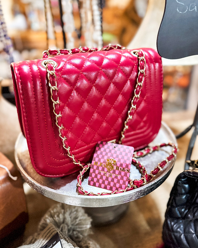 This crimson quilted handbag isn't just an accessory—it's waiting to become the main character in someone's "look what I found!" story.