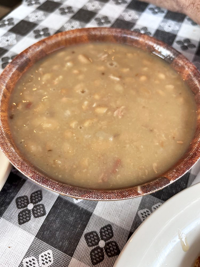White beans simmered to creamy perfection, with just enough pork to make vegetarians reconsider their life choices.