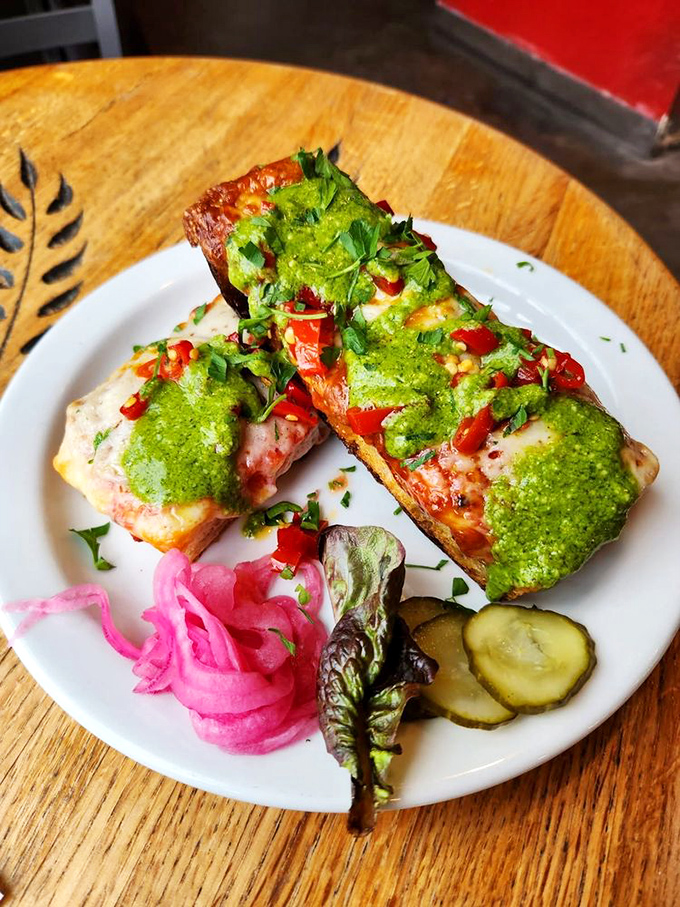 Bread as canvas, pesto as paint. This open-faced creation proves that sometimes the most beautiful art is the kind you can devour. 