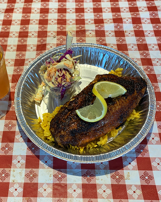 Blackened catfish on yellow rice with a side of slaw. Proof that Dangerously Delicious knows its way around savory dishes too.