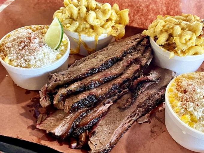 Brisket and sides sharing a tray like old friends at a reunion&mdash;except these friends are about to be devoured without mercy.