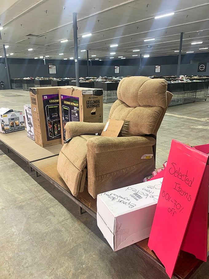 A recliner that's practically begging to become the new throne in someone's living room. The "Selected Items" sign teases greater savings ahead.