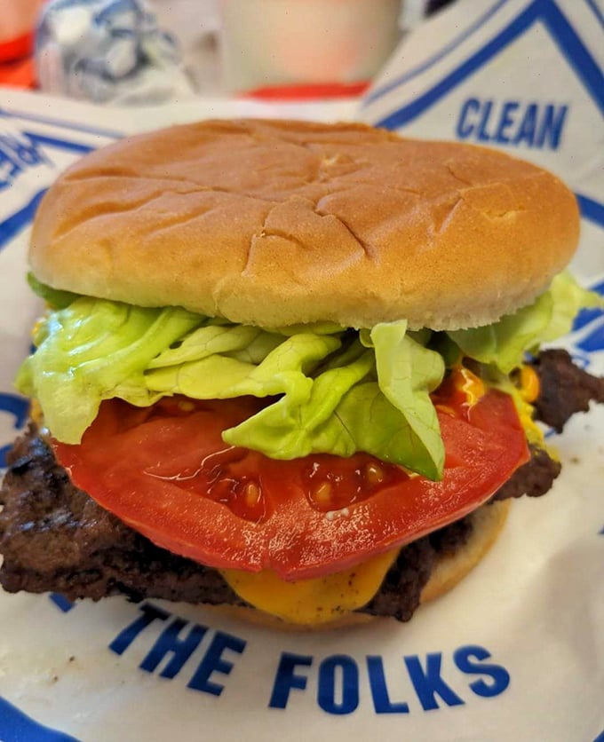 A burger so photogenic it doesn't need filters&mdash;just fresh ingredients stacked with the architectural precision of a tiny delicious skyscraper.