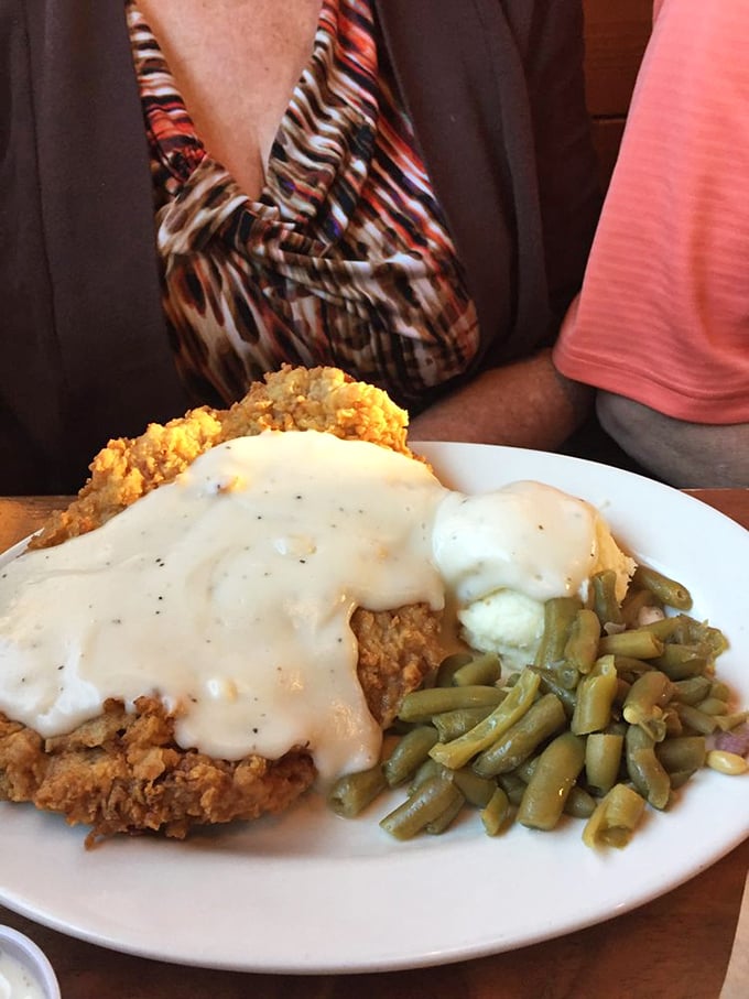 Some meals are worth the drive across county lines. This chicken fried steak with green beans and mashed potatoes is making a compelling argument for moving to Burrton permanently.