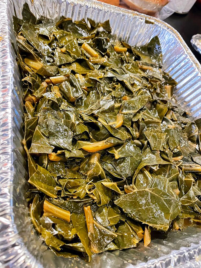 Southern collard greens cooked low and slow, turning humble vegetables into soul-warming comfort food gold.