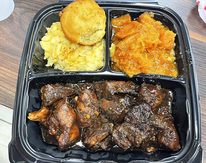 A takeout feast featuring bourbon chicken swimming in rich sauce, with mac and cheese that's achieved celebrity status in its own right.