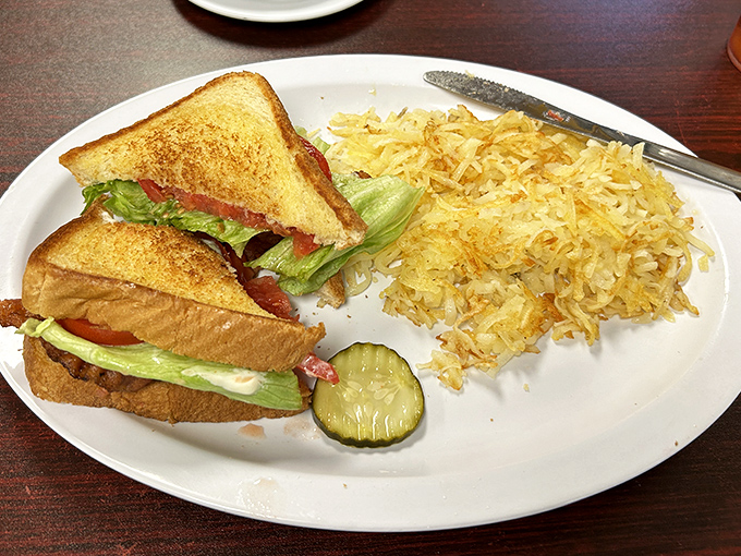 The BLT gets the royal treatment here&mdash;golden toast, garden-fresh veggies, and hash browns that glisten like edible sunshine.