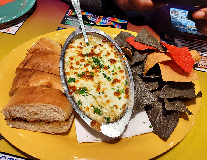 Bubbling cheese dip served with fresh bread and tortilla chips &ndash; because no coastal feast is complete without something to share.