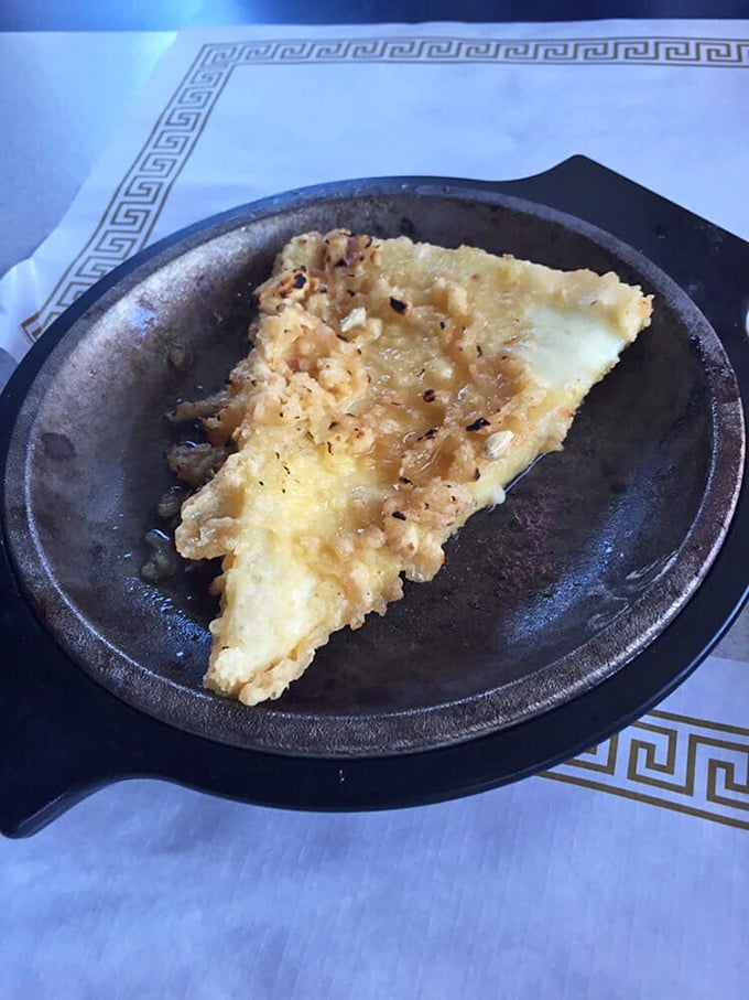 Golden-fried saganaki – where cheese transcends to divinity. Just one bite and you'll be shouting "Opa!" whether you're Greek or not.