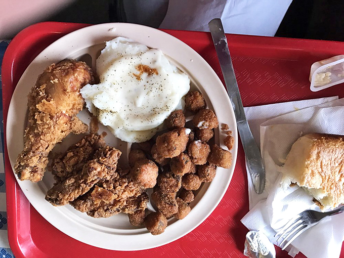 This isn't just fried chicken; it's a masterclass in crunch, served with sides that refuse to be overshadowed by the star.