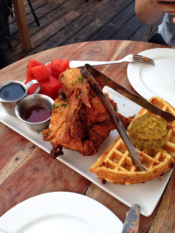 The dish that launched a thousand Instagram posts. That maple syrup waiting to cascade over crispy chicken is nature's perfect cliffhanger.