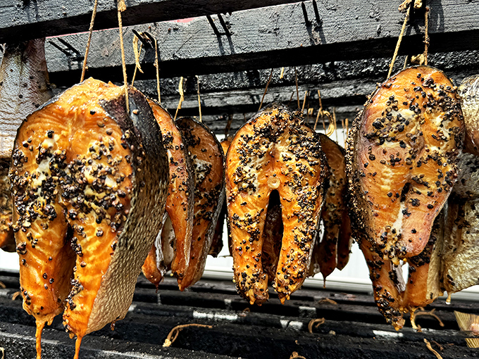 The smokehouse's magic transforms ordinary salmon into these pepper-crusted beauties. Like salmon that went to finishing school and graduated with honors.