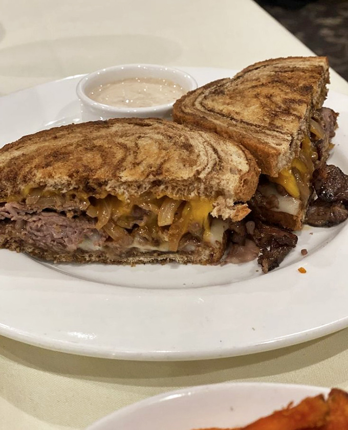 Not your childhood grilled cheese, unless your mom was secretly a gourmet chef. This grown-up sandwich deserves its own fan club.