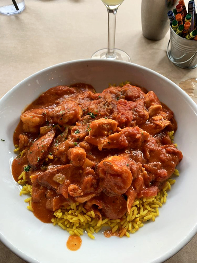 Jambalaya that brings New Orleans to Delaware, a spicy symphony of seafood and sausage over saffron rice. The South just nodded in approval.