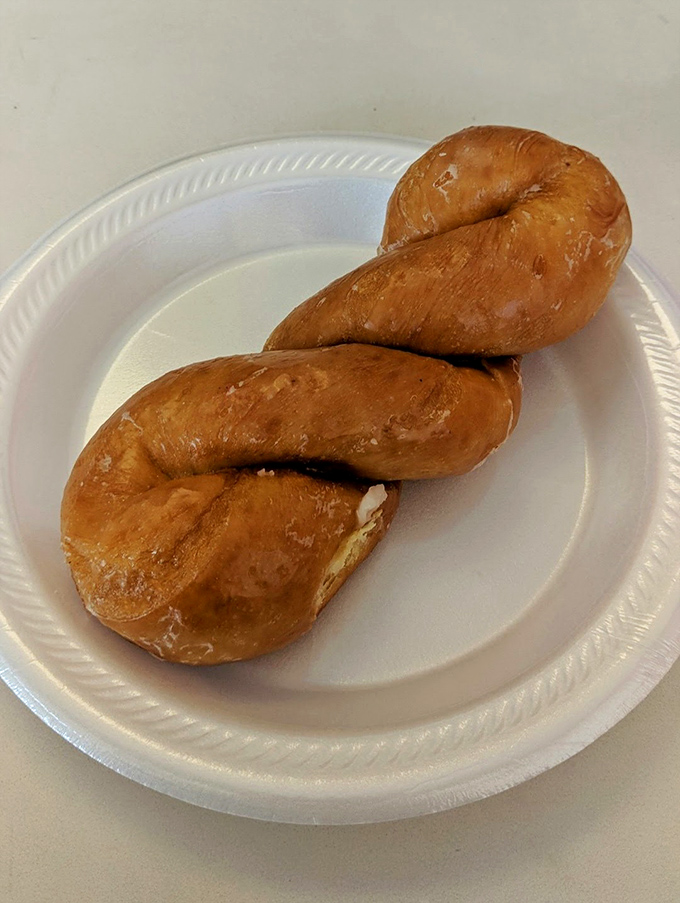 The twisted donut&mdash;proof that sometimes life's best pleasures come with a little complexity. Golden, gleaming, and gone too quickly if you're not careful.