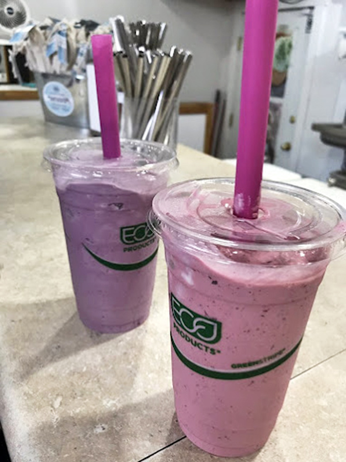 Twin towers of purple promise. These huckleberry shakes are thick enough to require both straw and spoon&mdash;the hallmark of milkshake excellence.